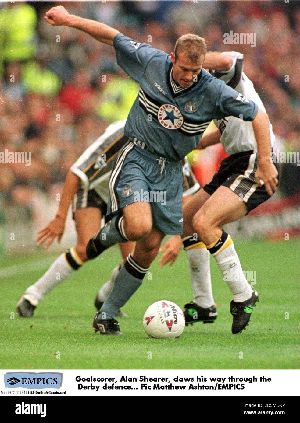 Alan Shearer, claws his way through the Derby defence Stock Photo - Alamy