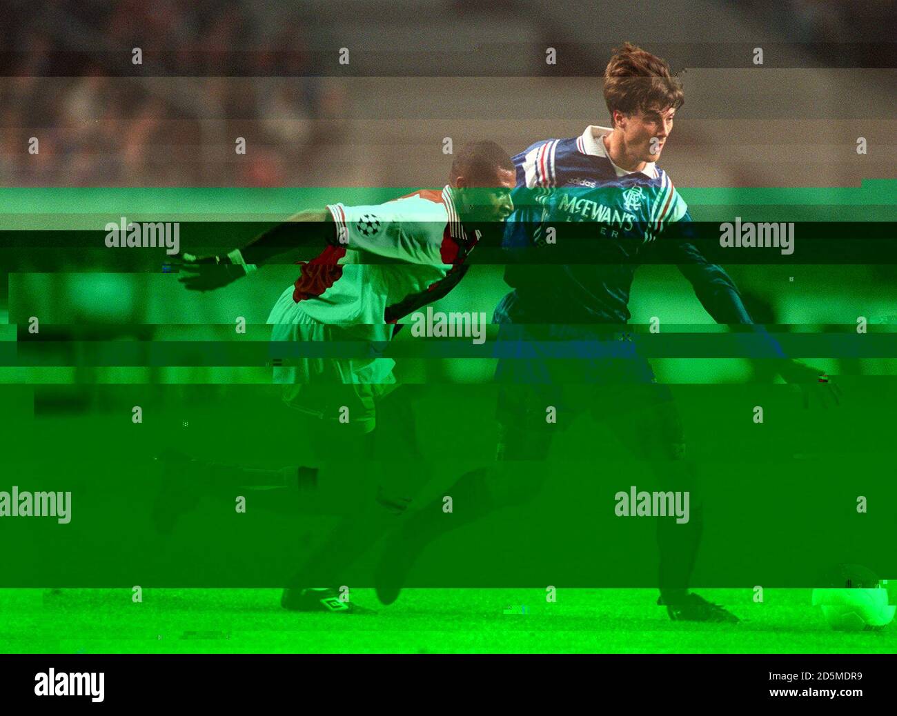 L-R: Winston Bogarde, Ajax Amsterdam and Brian Laudrup, Glasgow Rangers ...