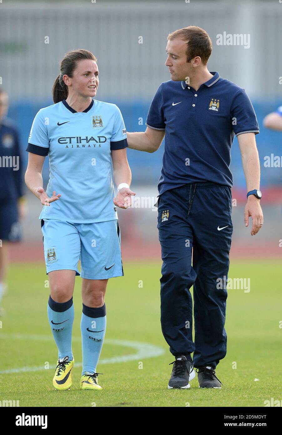 Manchester City Women's Krystle Johnson speaks with head coach Nick ...