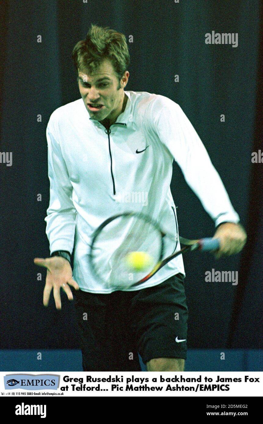 Greg Rusedski plays a backhand to James Fox at Telford Stock Photo - Alamy