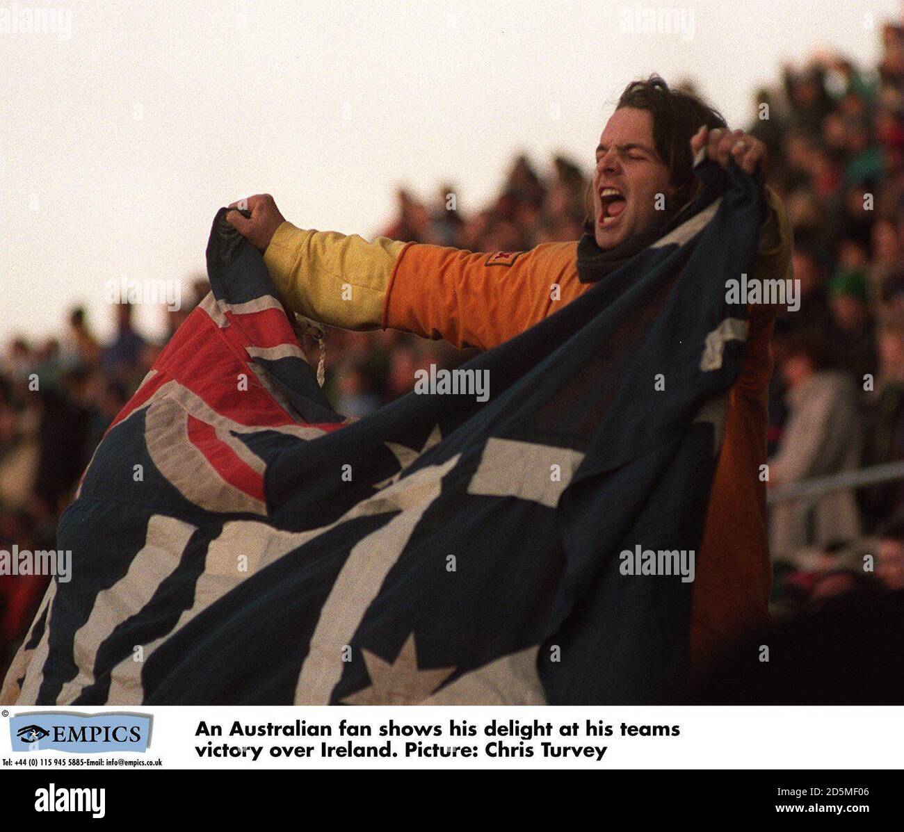 An Australian fan shows his delight at his teams victory over Ireland ...