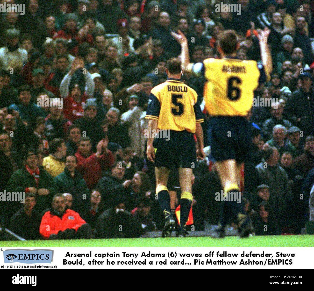 Arsenal captain Tony Adams (6) waves off fellow defender, Steve Bould ...