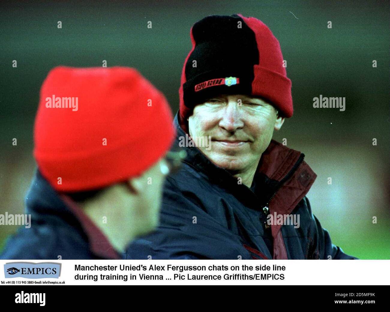 Manchester United's Alex Ferguson chats on the side line during ...