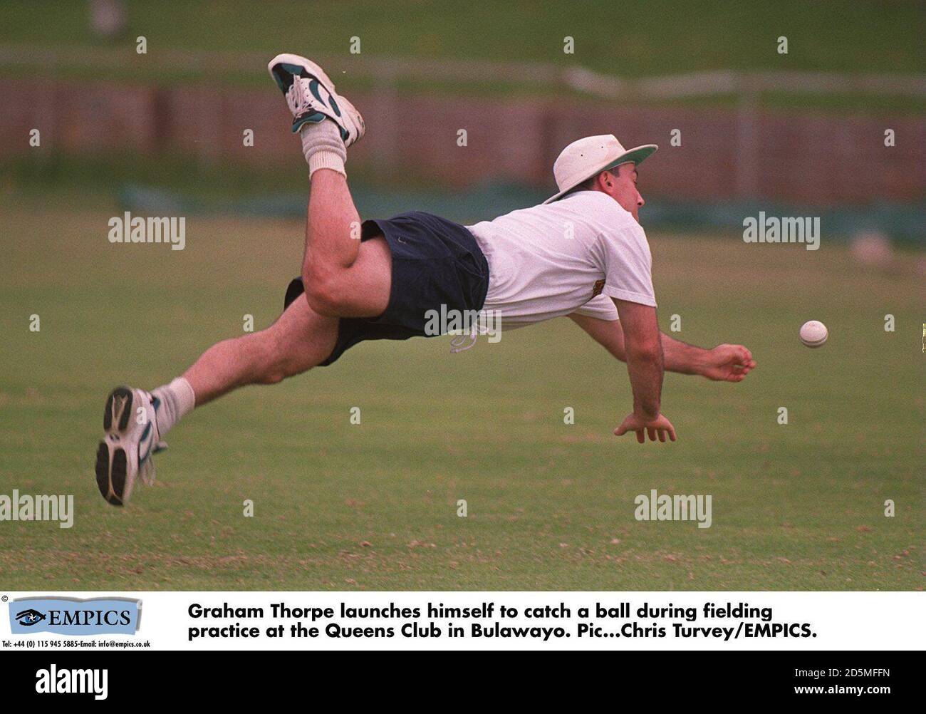 Graham Thorpe launches himself to catch a ball during fielding practice ...