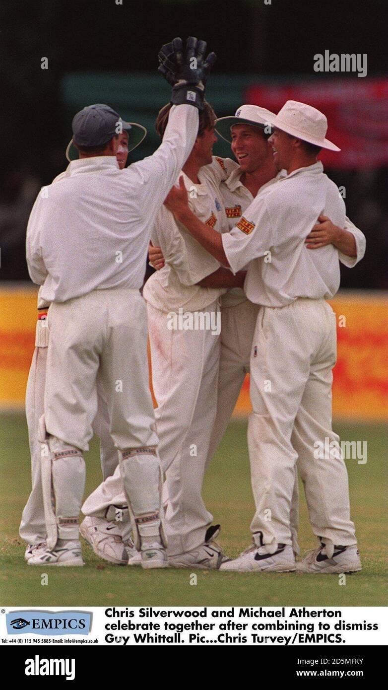 Chris Silverwood and Michael Atherton celebrate together after ...