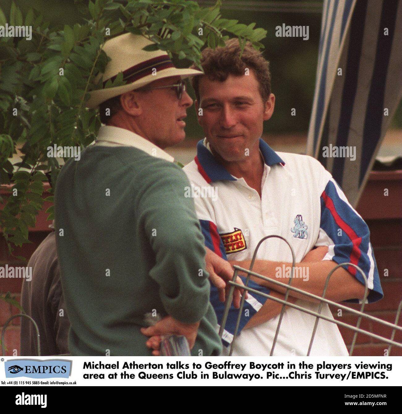 Michael Atherton talks to Geoffrey Boycott in the players viewing area ...