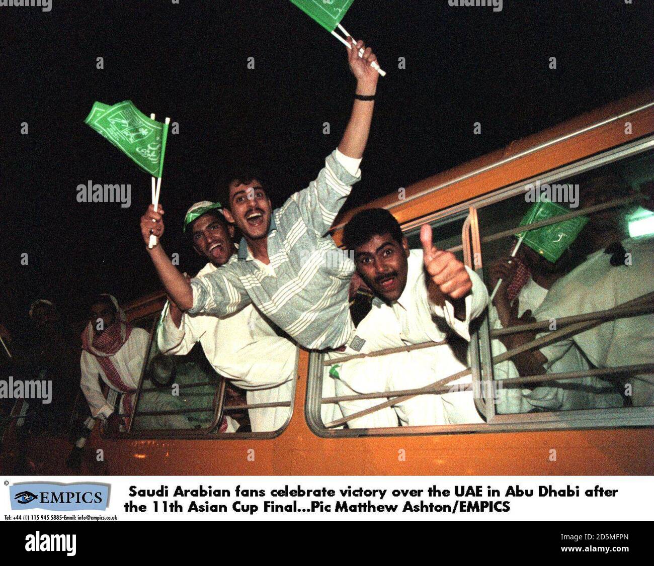 Saudi Arabian fans celebrate victory over the UAE in Abu Dhabi after ...
