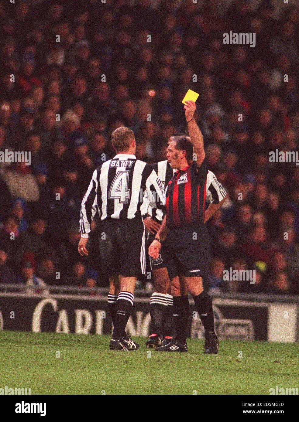 David Batty - Newcastle United is booked by referee Mike Reed Stock ...