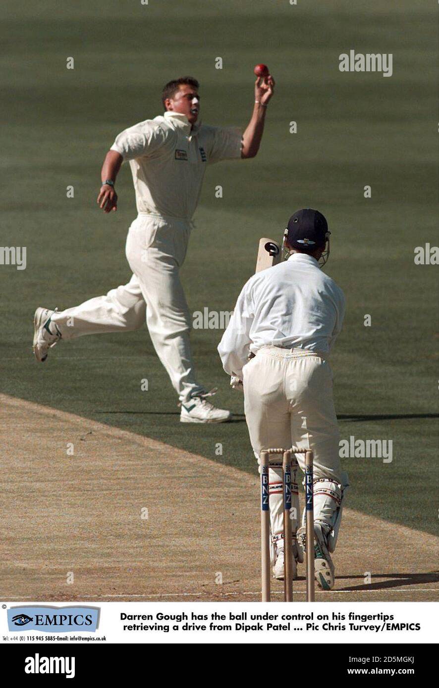 Darren Gough has the ball under control on his fingertips retrieving a ...