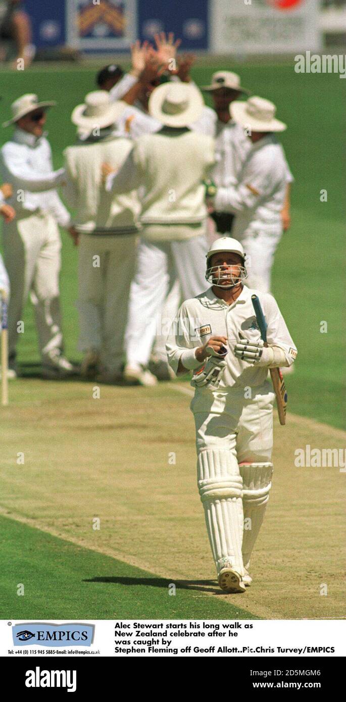 Alec Stewart starts his long walk as New Zealand celebrate after he was ...