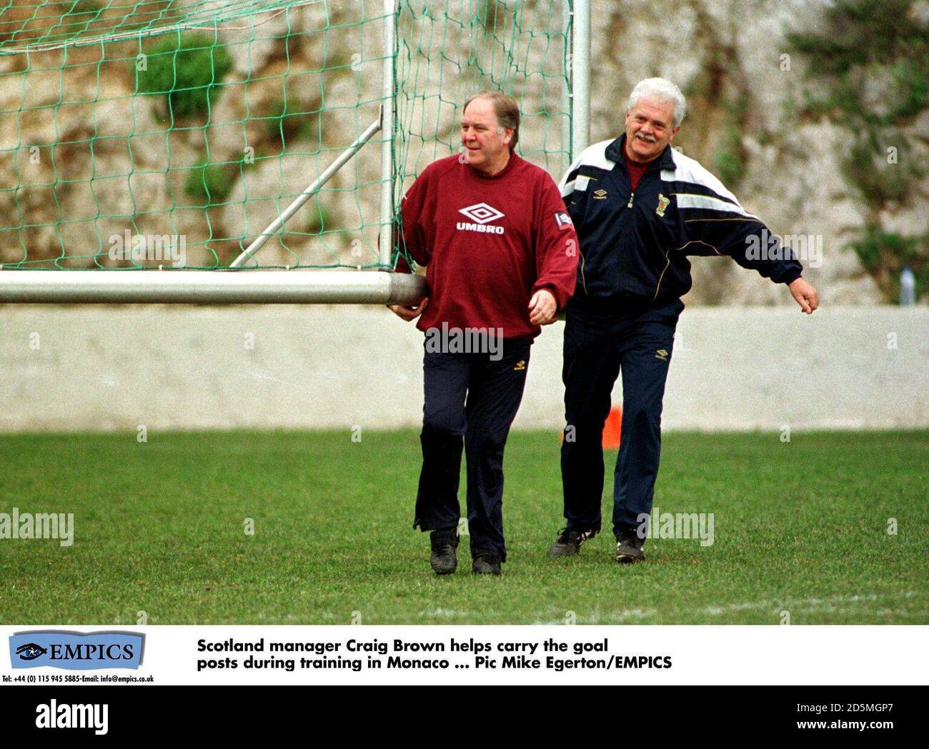 Scotland manager Craig Brown helps carry the goal posts during training ... Scotland manager Craig Brown helps carry the goal posts during training ...