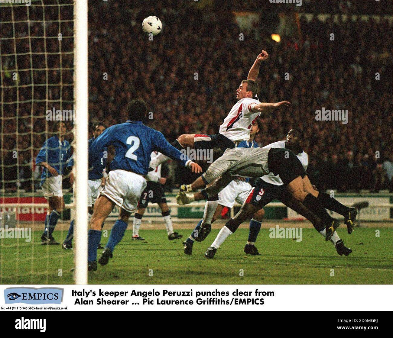 Italy's keeper Angelo Peruzzi punches clear from Alan Shearer Stock ...