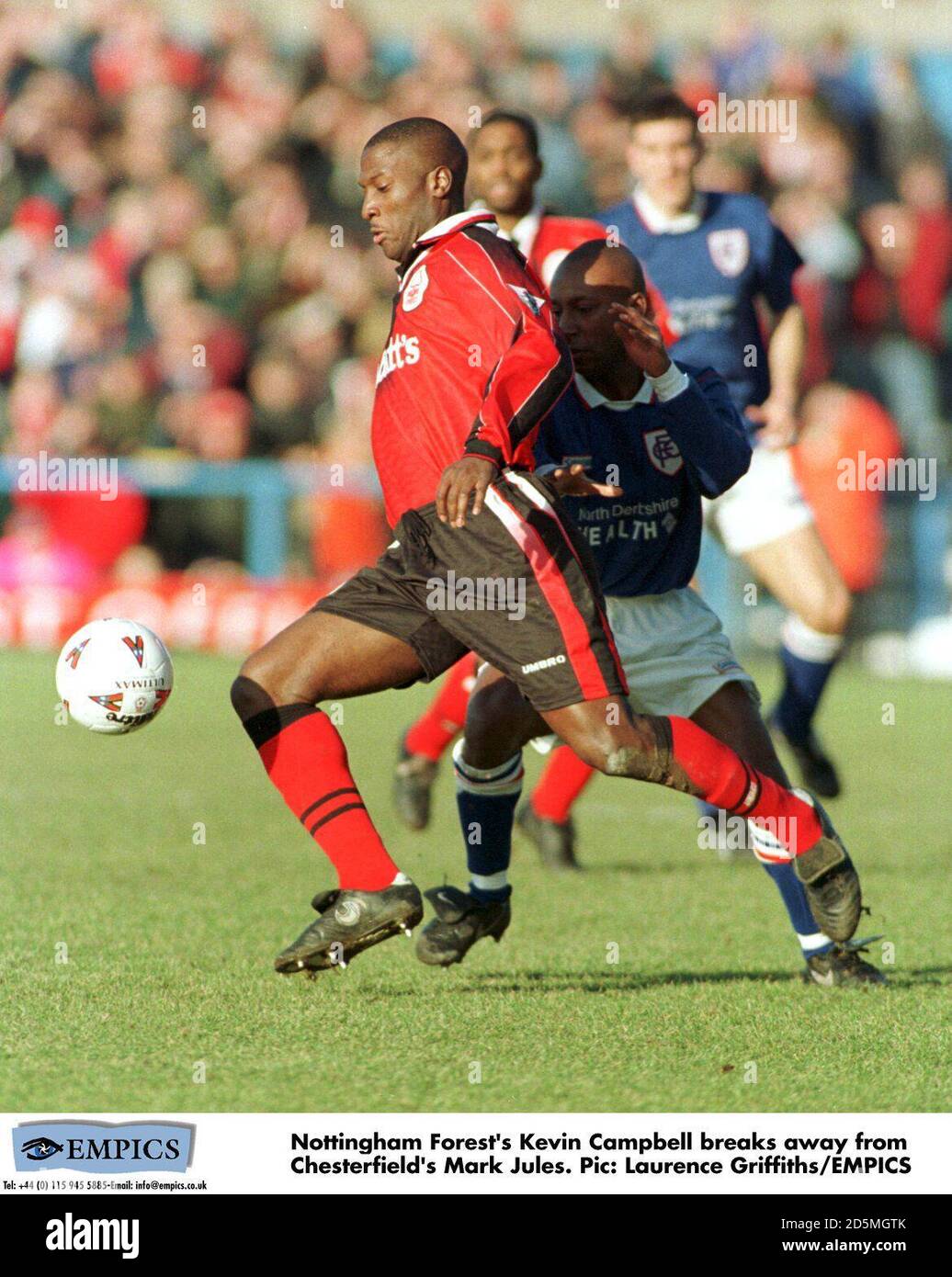 Nottingham Forest's Kevin Campbell breaks away from Chesterfield's Mark ...
