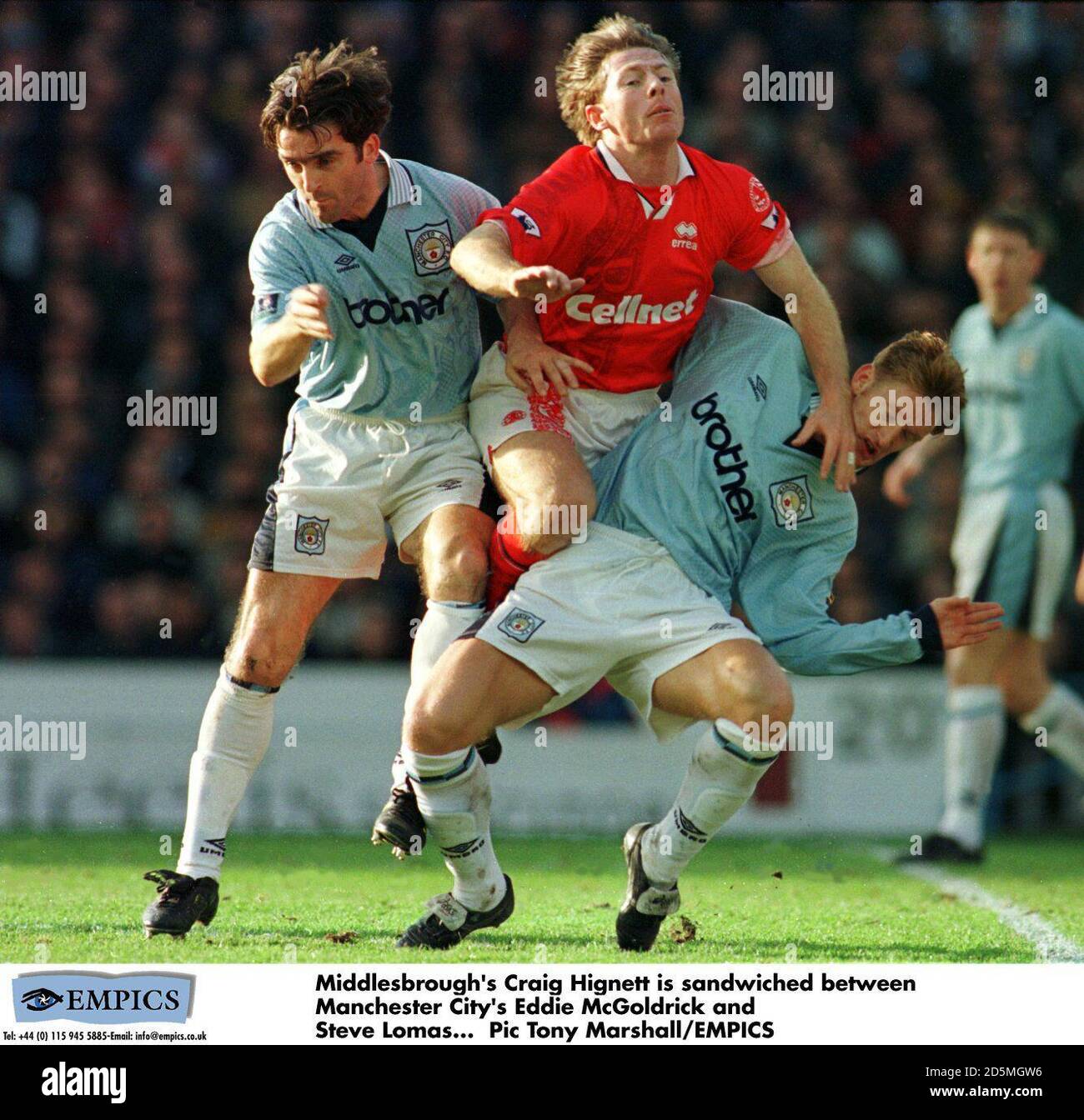 Middlesbrough's Craig Hignett is sandwiched between Manchester City's ...