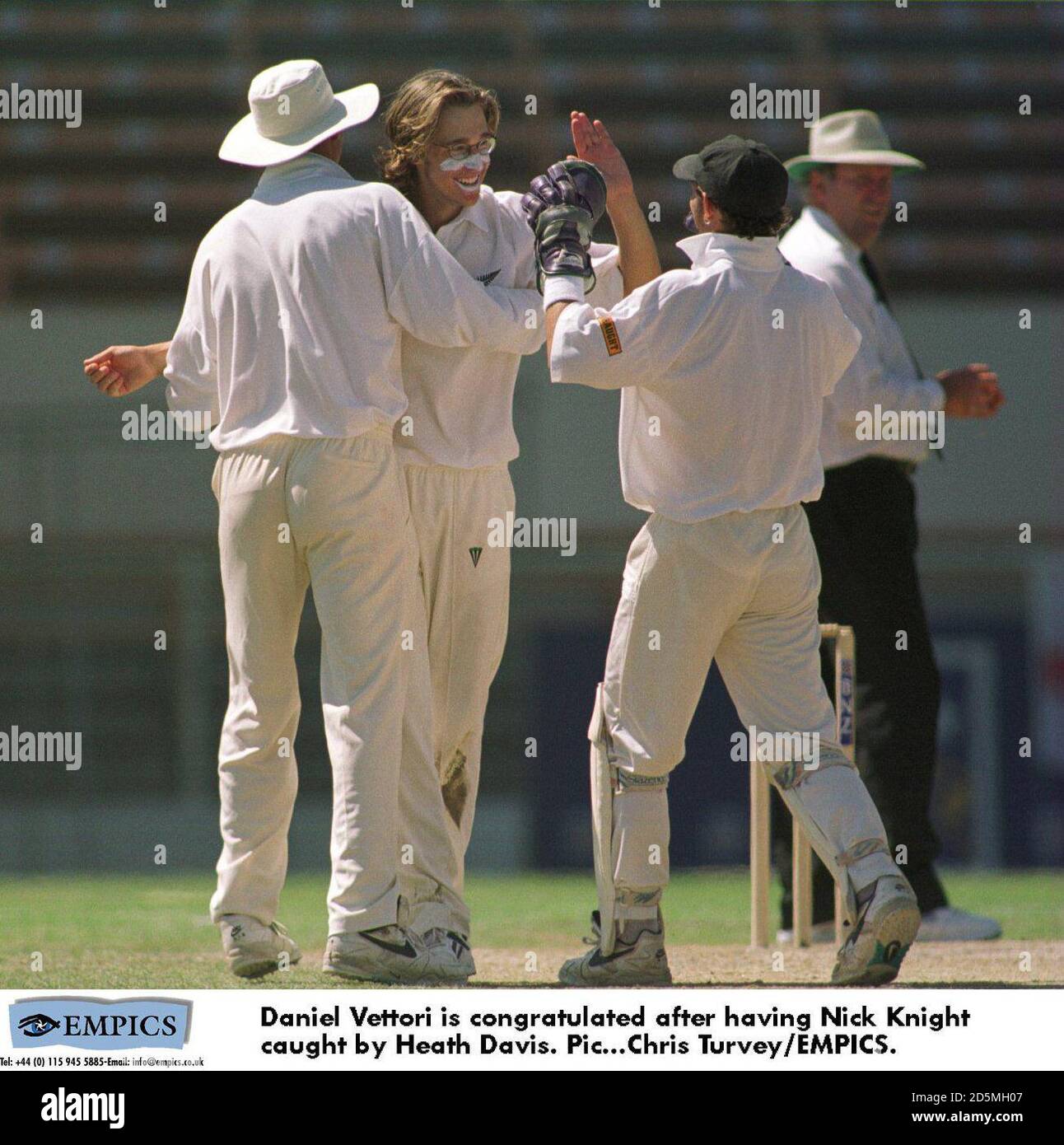 Daniel Vettori is congratulated after having Nick Knight caught by ...