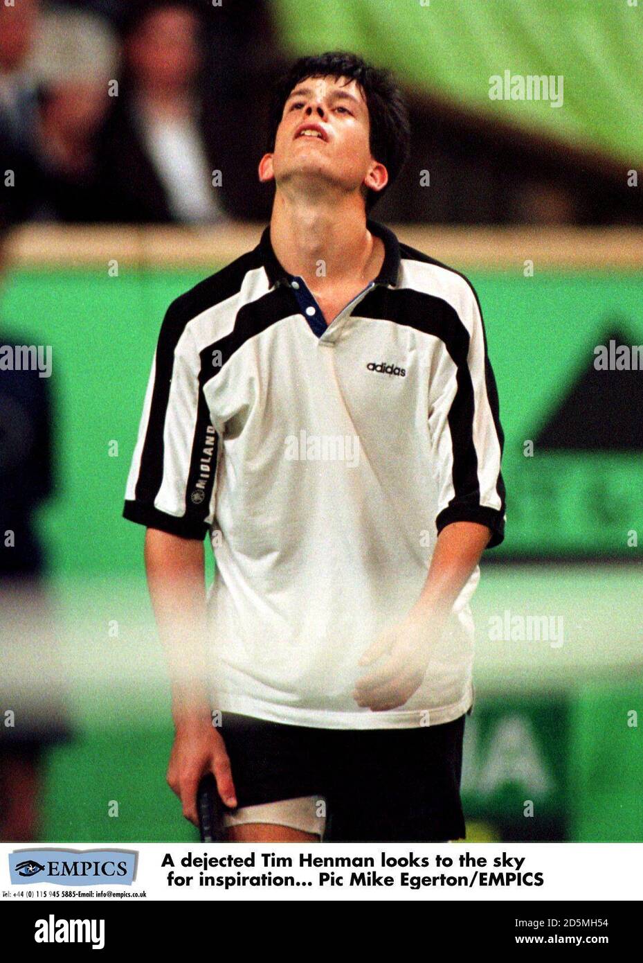 A dejected Tim Henman looks to the sky for inspiration Stock Photo - Alamy