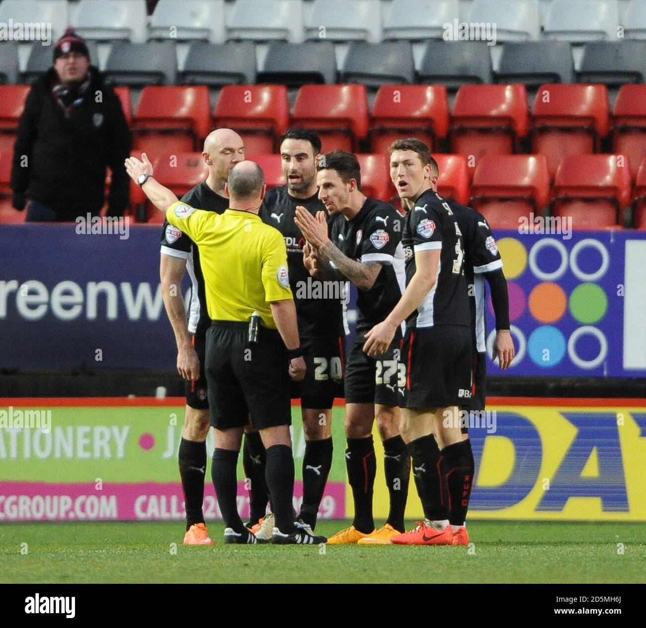 Rotherham Town's players surround referee Scott Duncan Stock Photo - Alamy