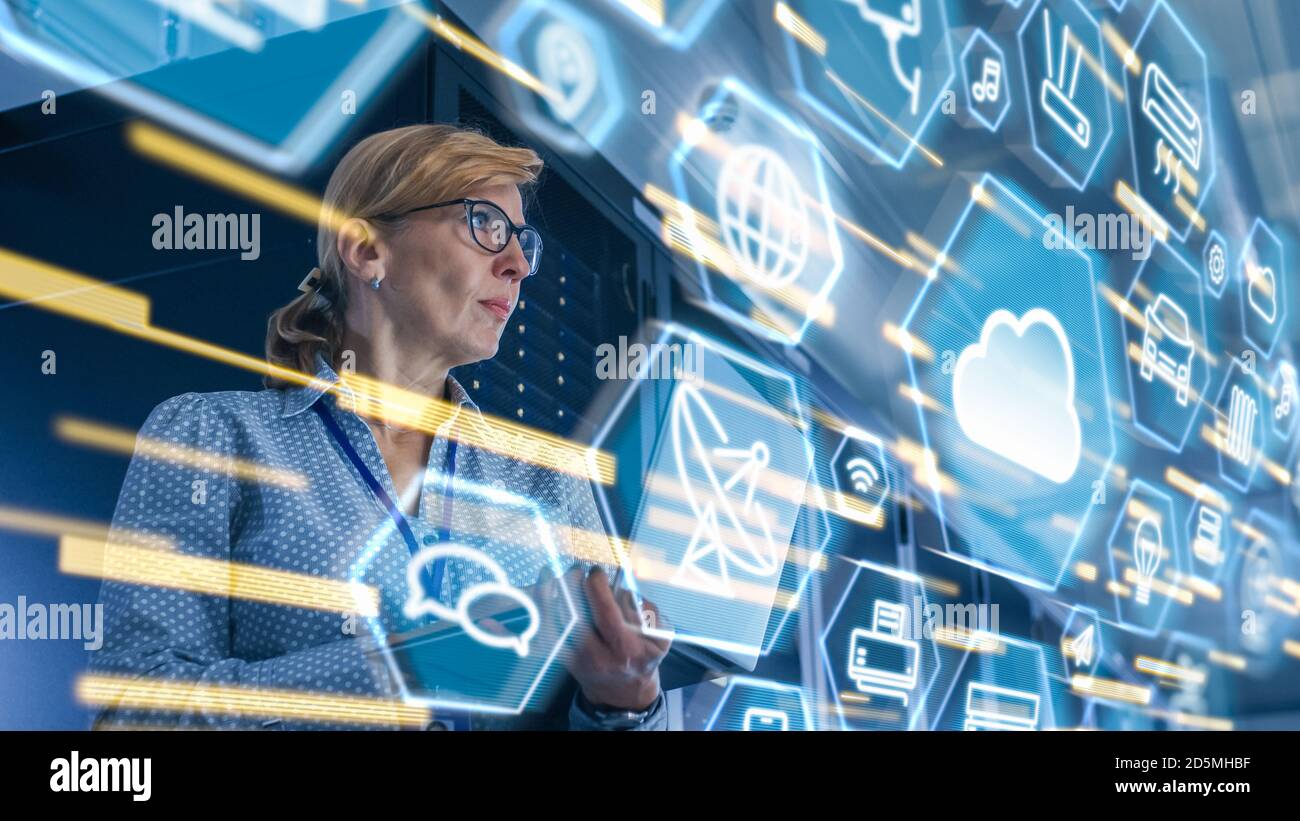 Female IT Server Specialist Standing in Data Center. View from Rack ...