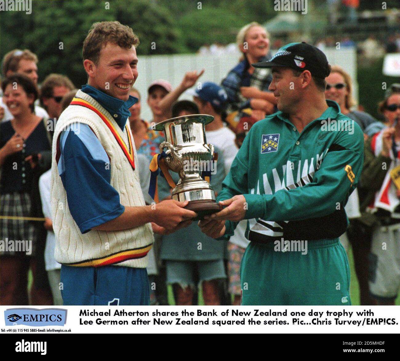 Michael Atherton shares the Bank of New Zealand one day trophy with Lee ...