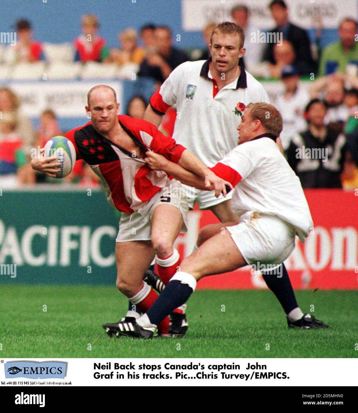 Neil Back stops Canada's captain John Graf in his tracks Stock Photo ...