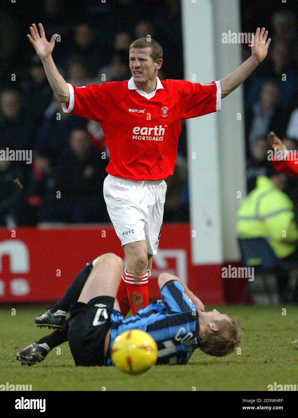 Rotherham United's Chris Swailes raises his arms in innocence after ...
