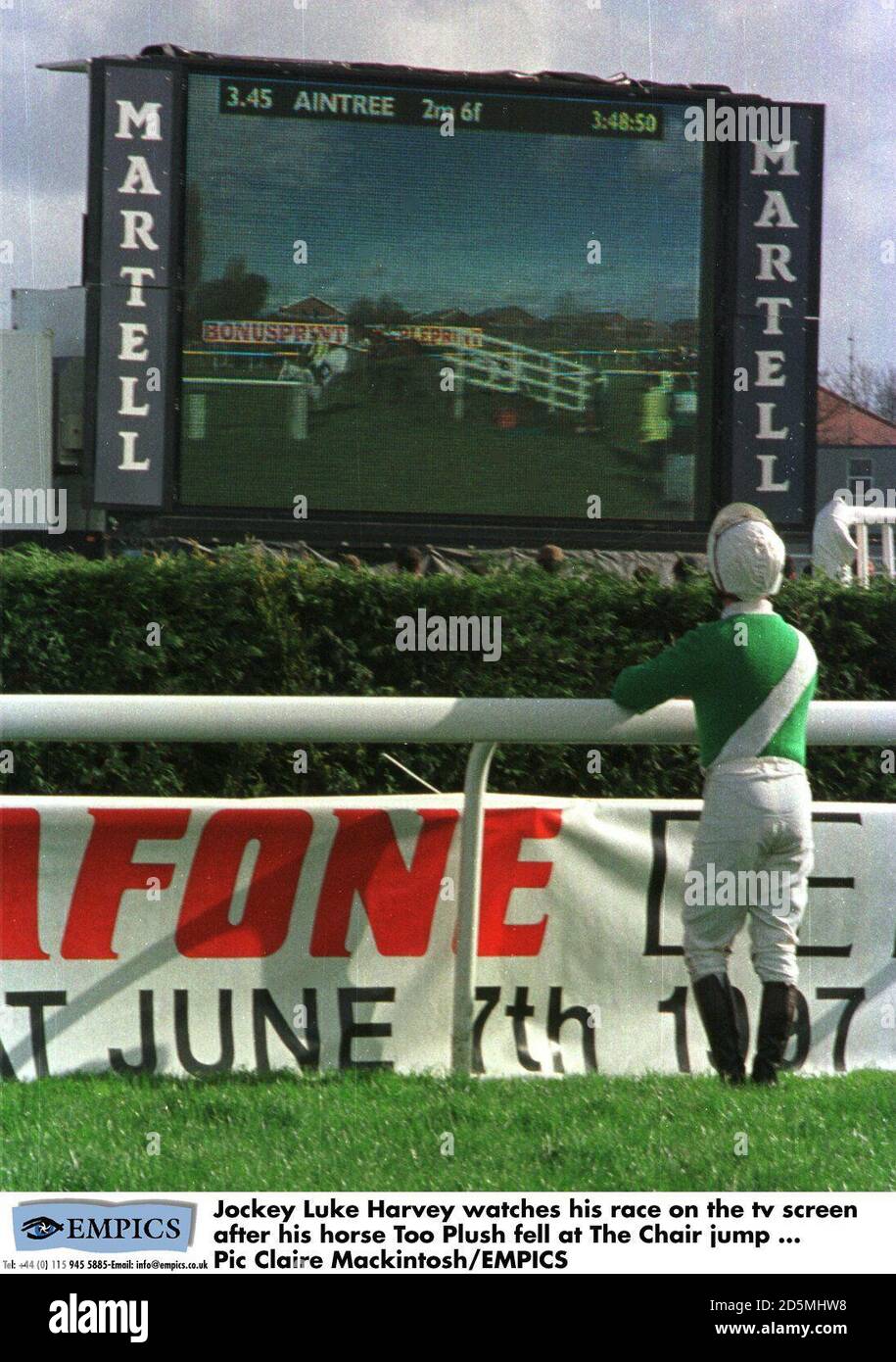 Jockey Luke Harvey watches his race on the tv screen after his horse ...