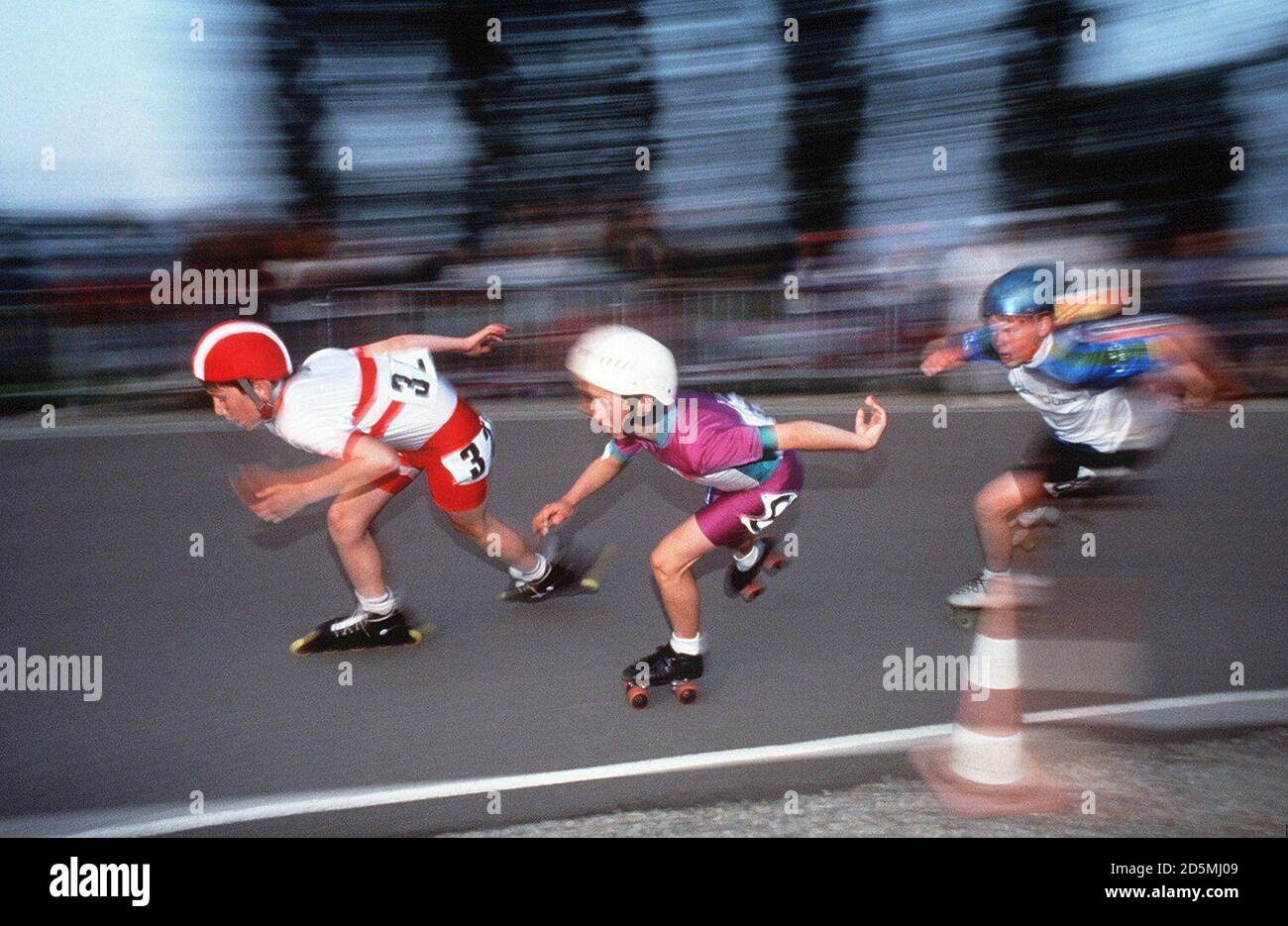 Children Roller Blading- In Line Skating Stock Photo - Alamy