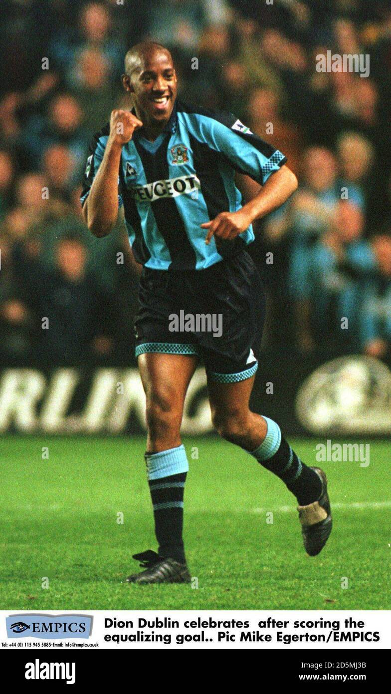 Dion Dublin celebrates after scoring the equalizing goal Stock Photo ...