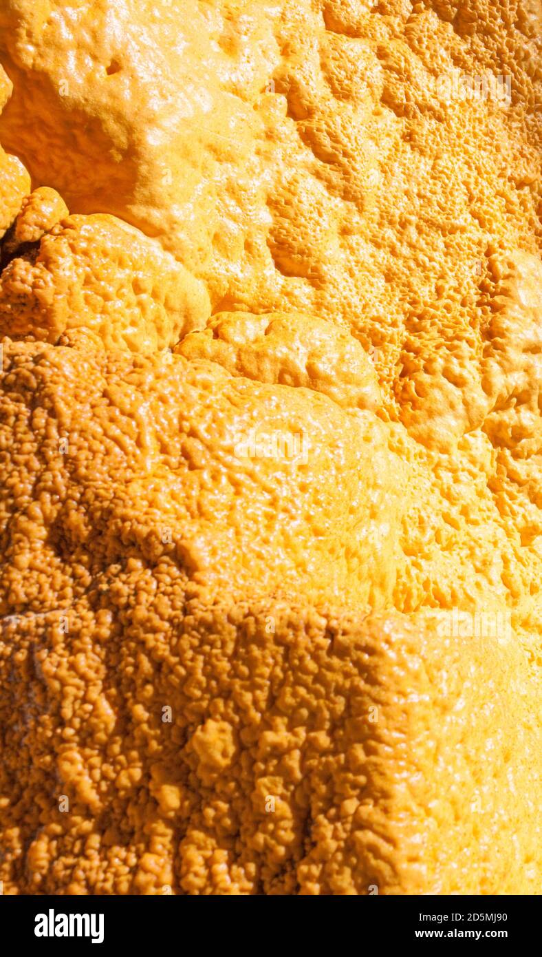 External insulation of house walls with yellow sprayed polyurethane ...