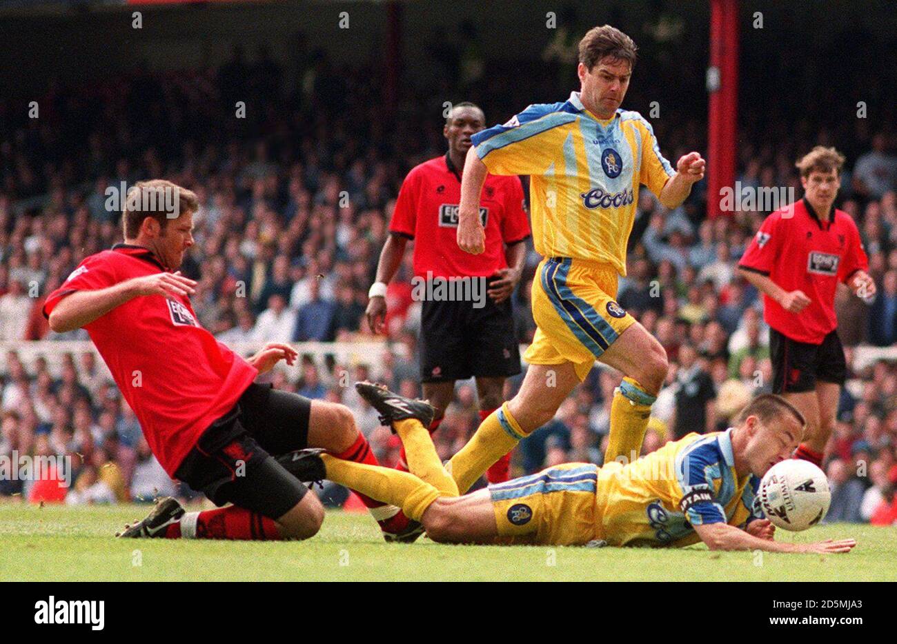 Alan Kimble, Wimbledon tackles Dennis Wise, Chelsea Stock Photo - Alamy