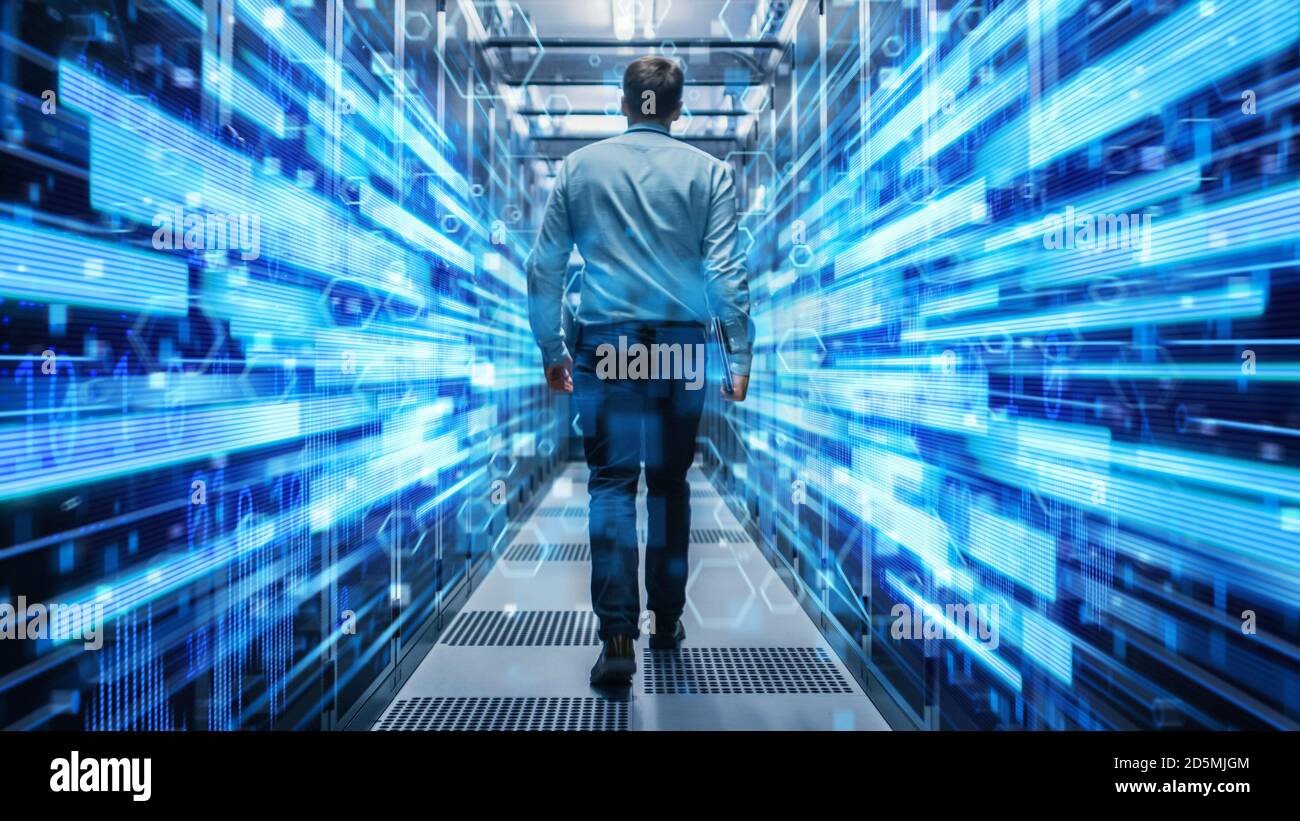 Shot of a Young It Specialist Walking through Corridor in Working Data ...