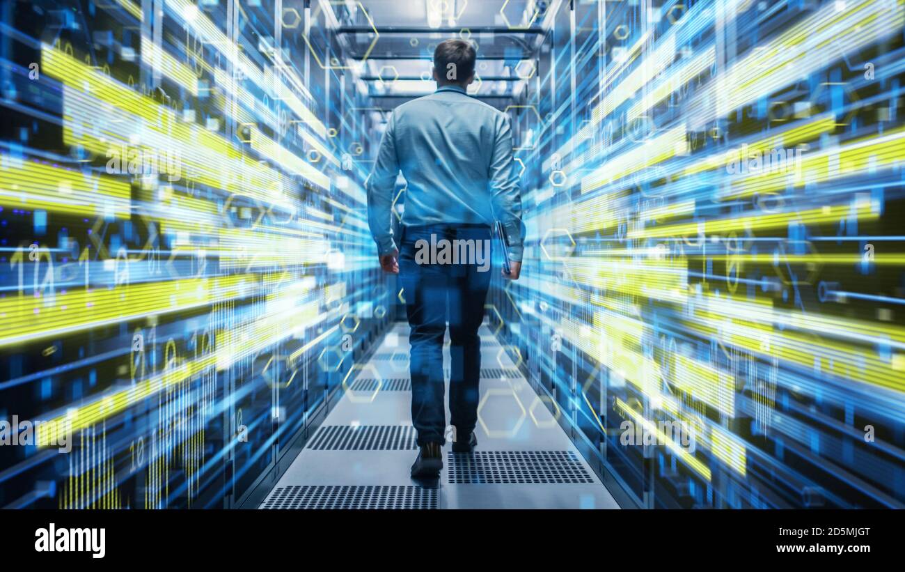 Shot of a Young It Specialist Walking through Corridor in Working Data ...