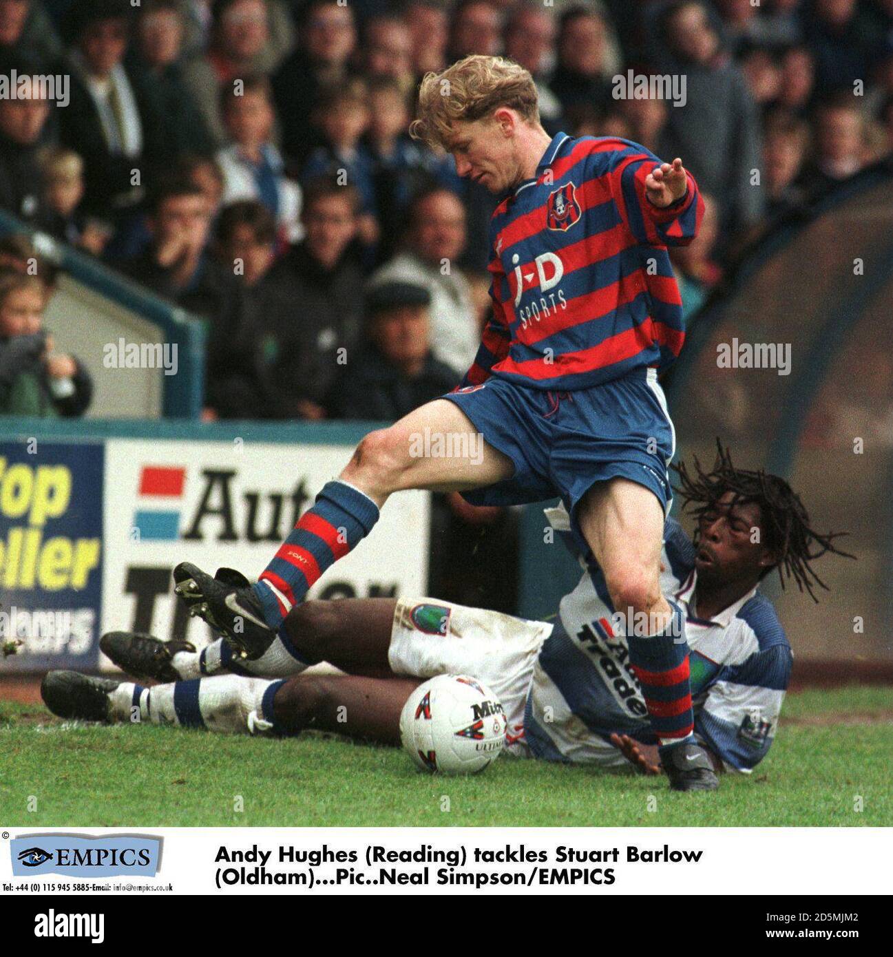 Andy Hughes (Reading) tackles Stuart Barlow (Oldham Stock Photo - Alamy
