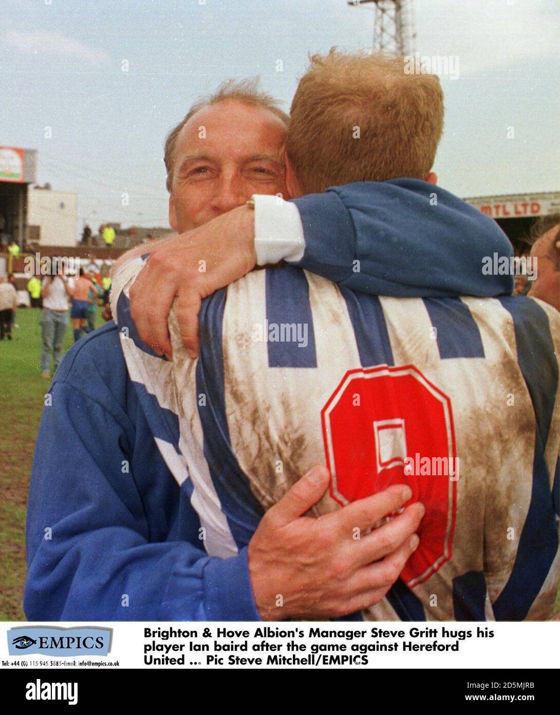 Brighton & Hove Albion's Manager Steve Gritt hugs his player Ian baird ...