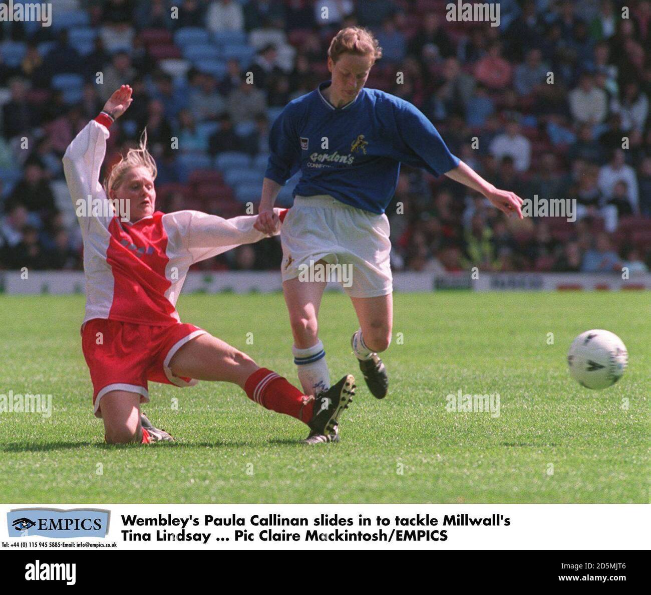 Wembley's Paula Callinan slides in to tackle Millwall's Tina Lindsay ...
