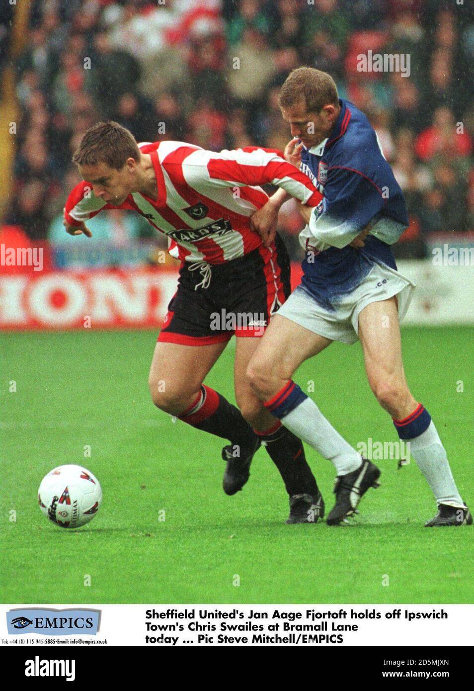 Sheffield United's Jan Aage Fjortoft holds off Ipswich Town's Chris ...