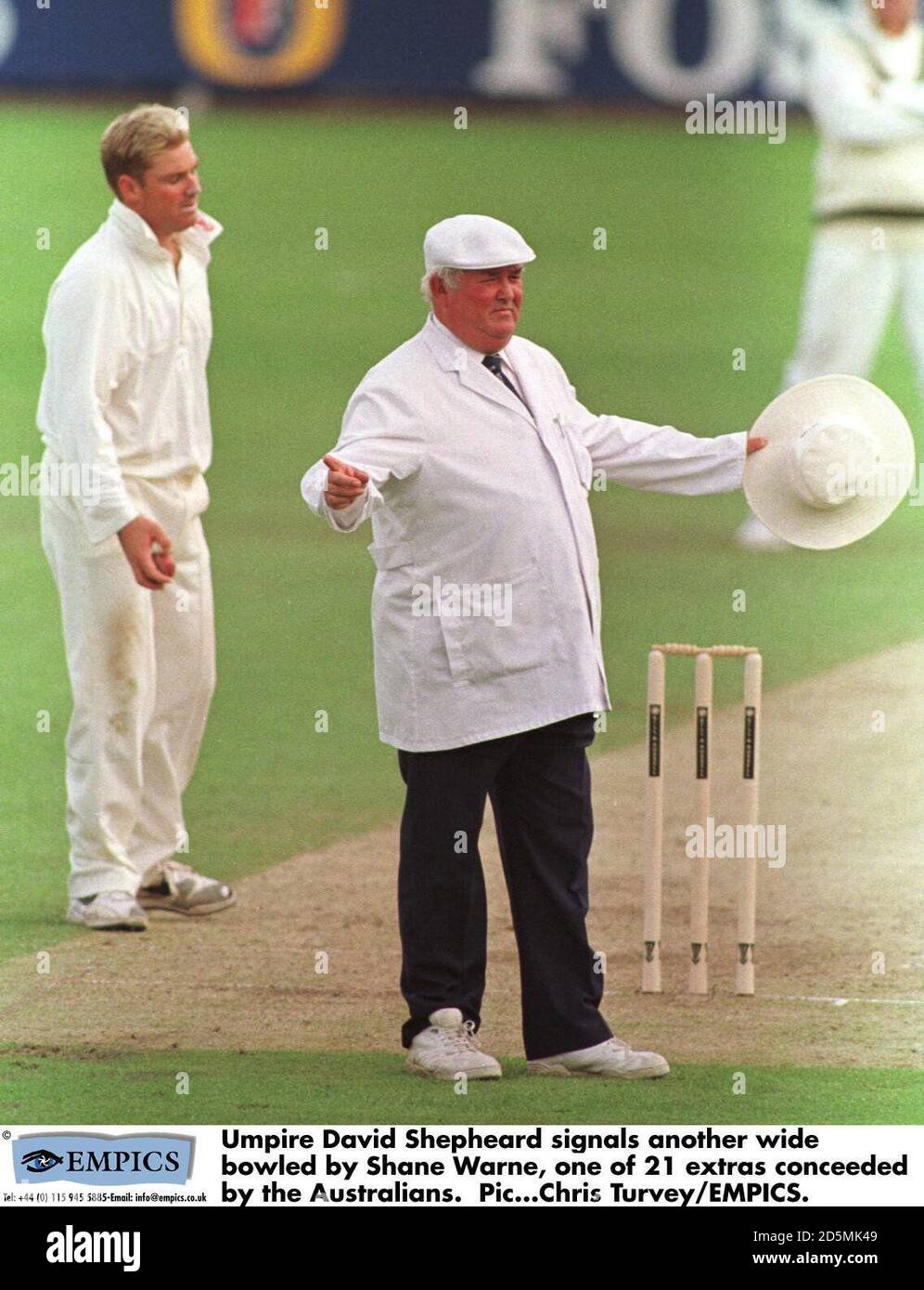 Umpire David Shepherd signals another wide bowled by Shane Warne, one ...