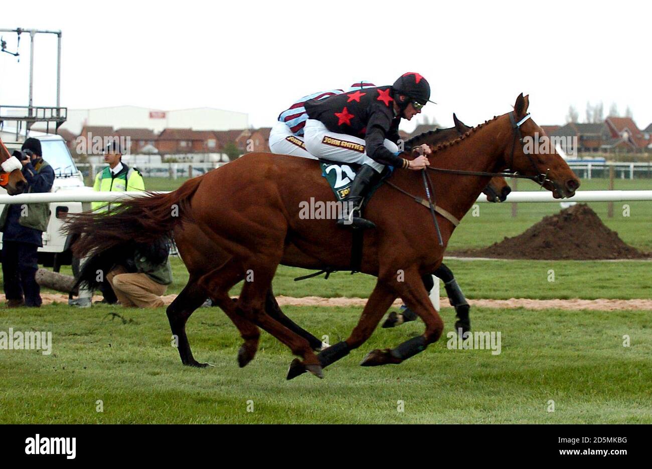 Cregg House ridden by David Russell comes home to win The John Smith's ...