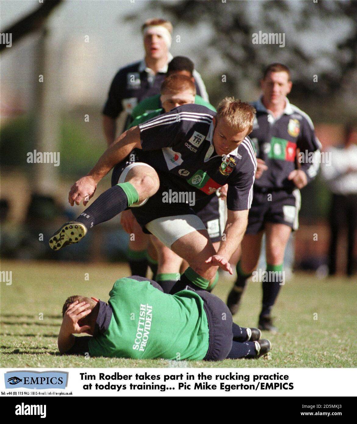 Tim Rodber(centre,standing) takes part in the rucking practice at ...