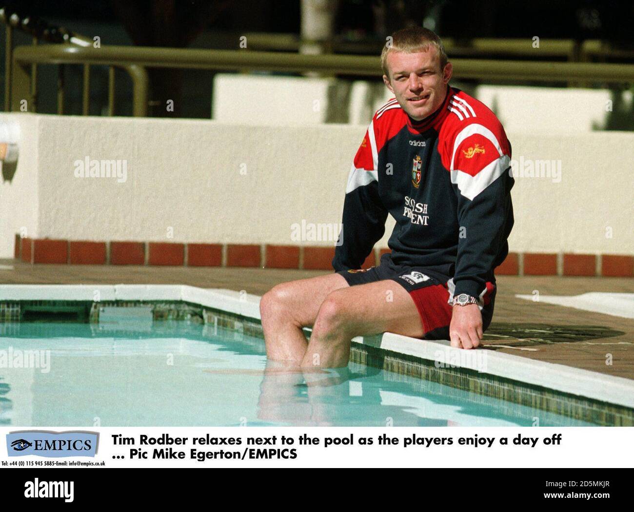 Tim Rodber relaxes next to the pool as the players enjoy a day off ...