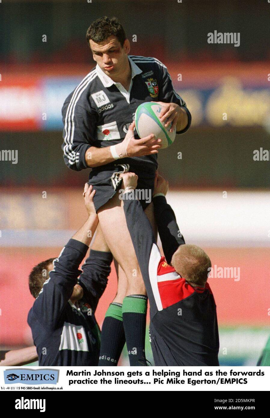 Martin Johnson gets a helping hand as the forwards practice the ...