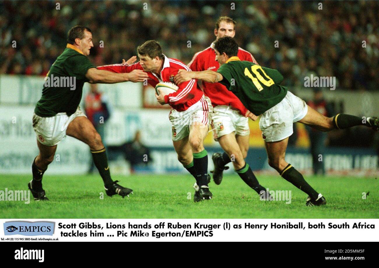 Scott Gibbs, Lions hands off Ruben Kruger (l) as Henry Honiball, both ...