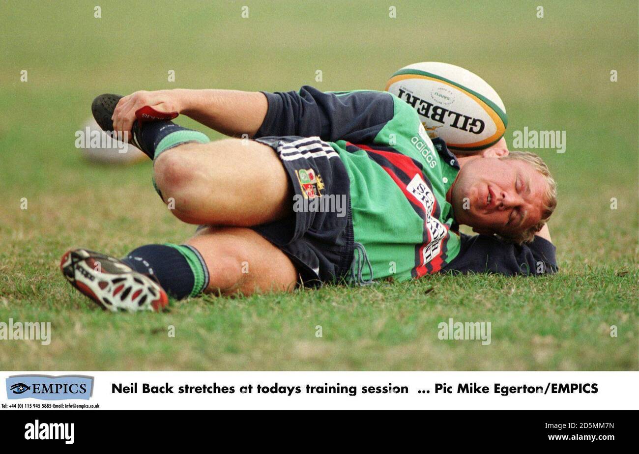 Neil Back stretches at todays training session Stock Photo - Alamy