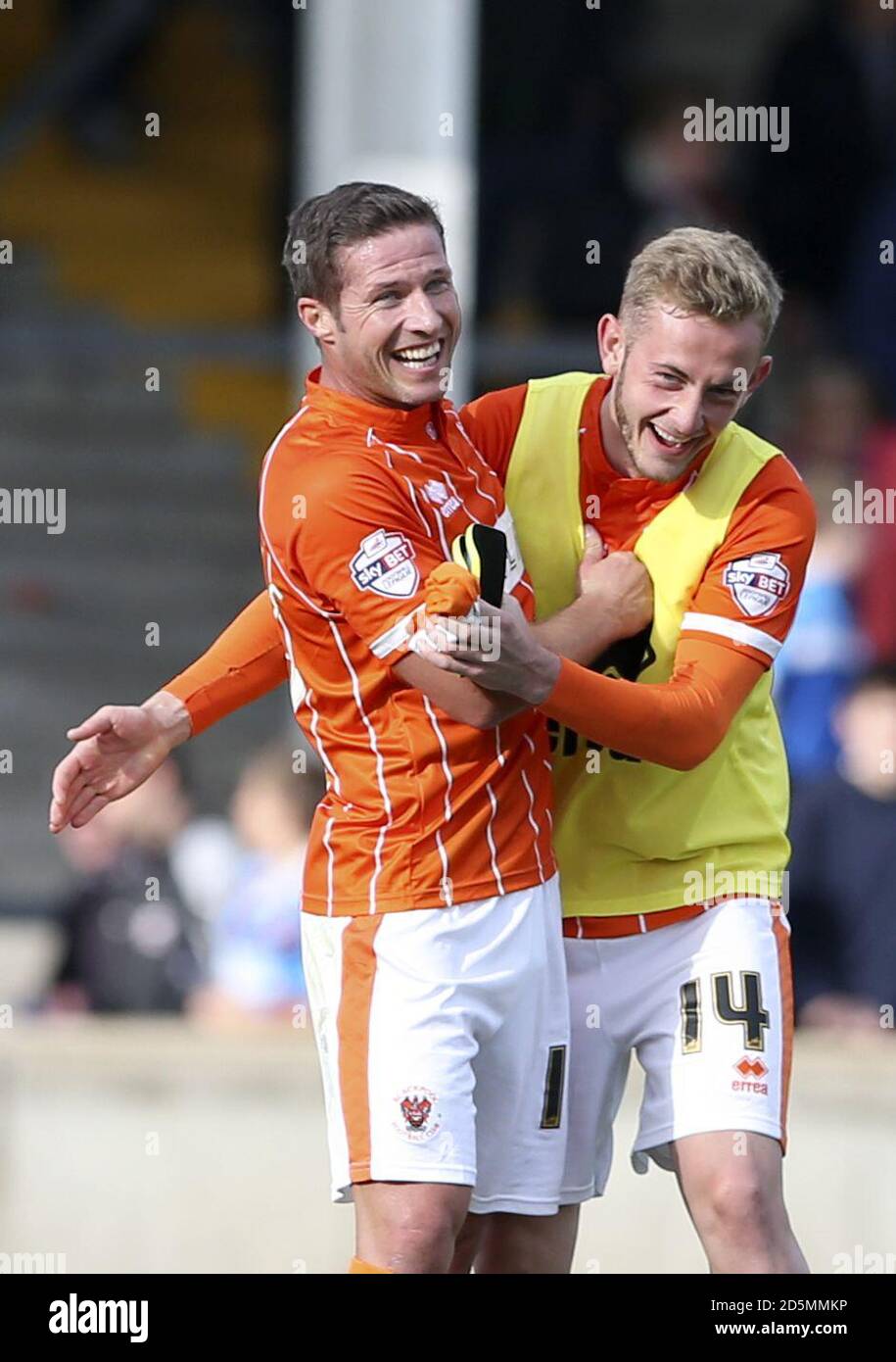 Blackpool's David Norris and John Herron celebrate Brad Pott's goal ...