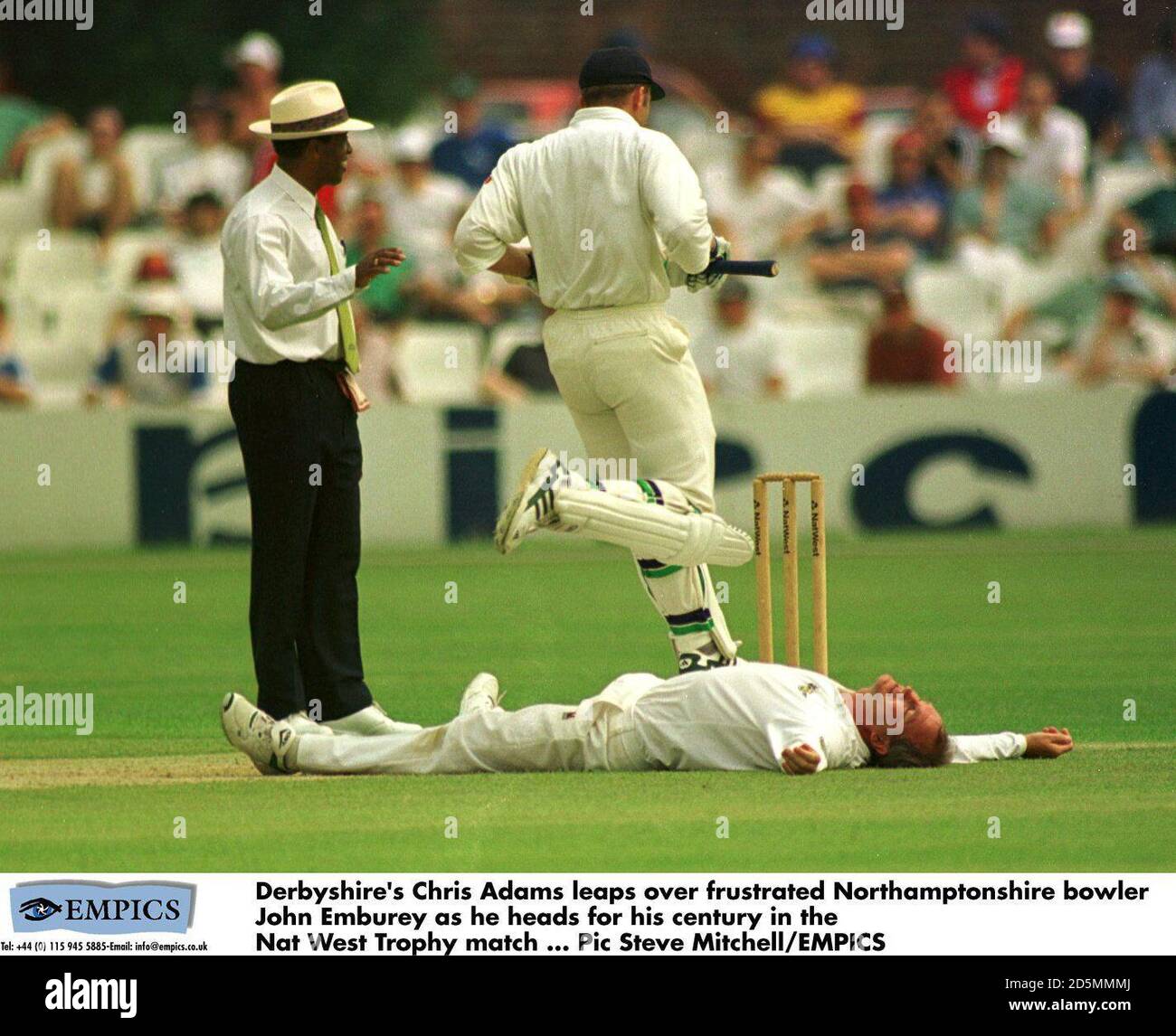 Derbyshire's Chris Adams leaps over frustrated Northamptonshire bowler ...