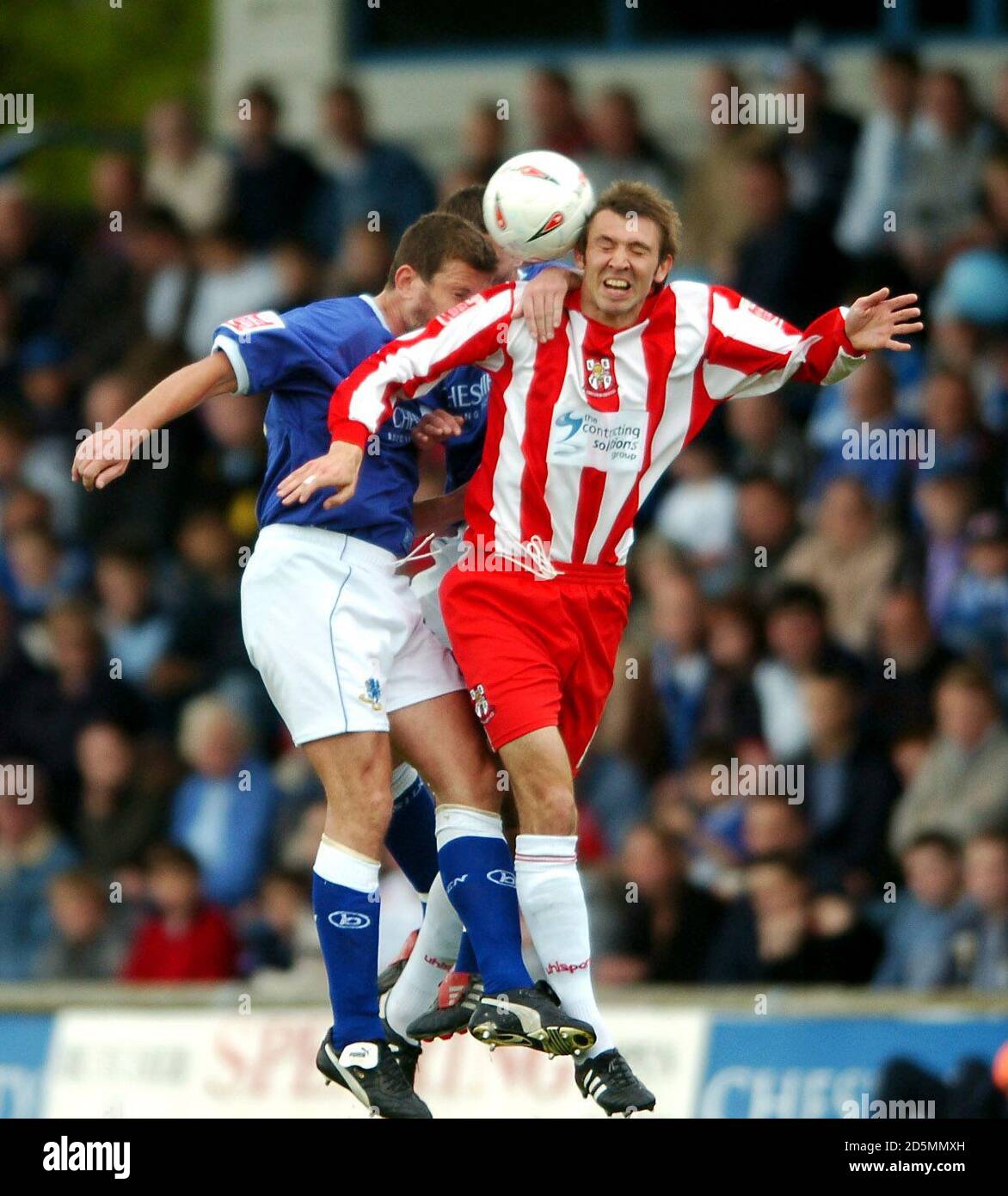 Macclesfield Town's Tony Barras and Lincoln City's Gareth McCauley ...
