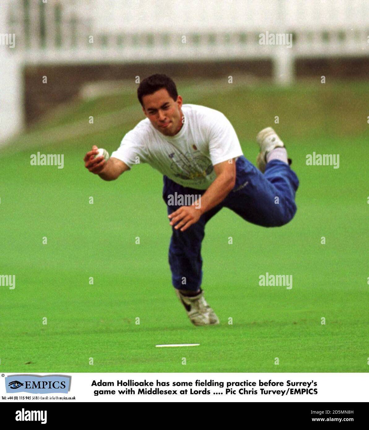 Adam Hollioake has some fielding practice before Surrey's game with ...