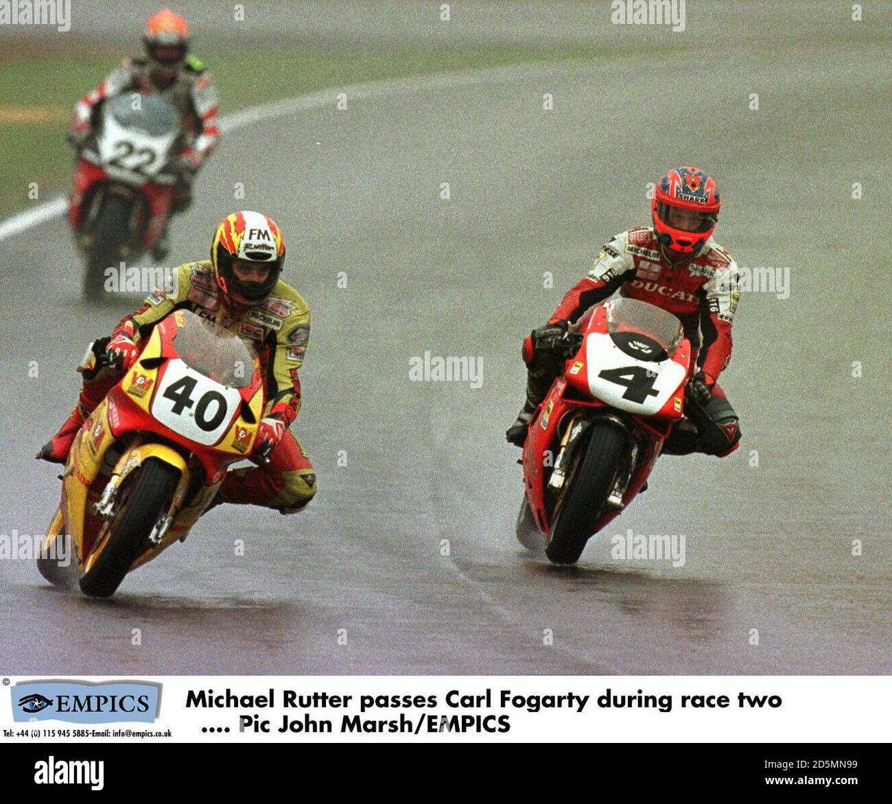 Michael Rutter passes Carl Fogarty during race two Stock Photo - Alamy
