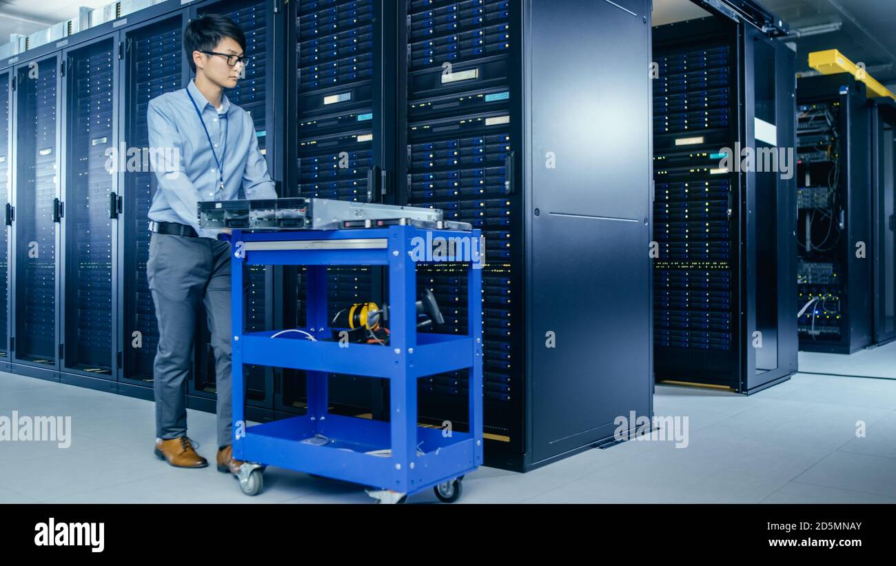 Engineer walking on data center hi-res stock photography and images - Alamy