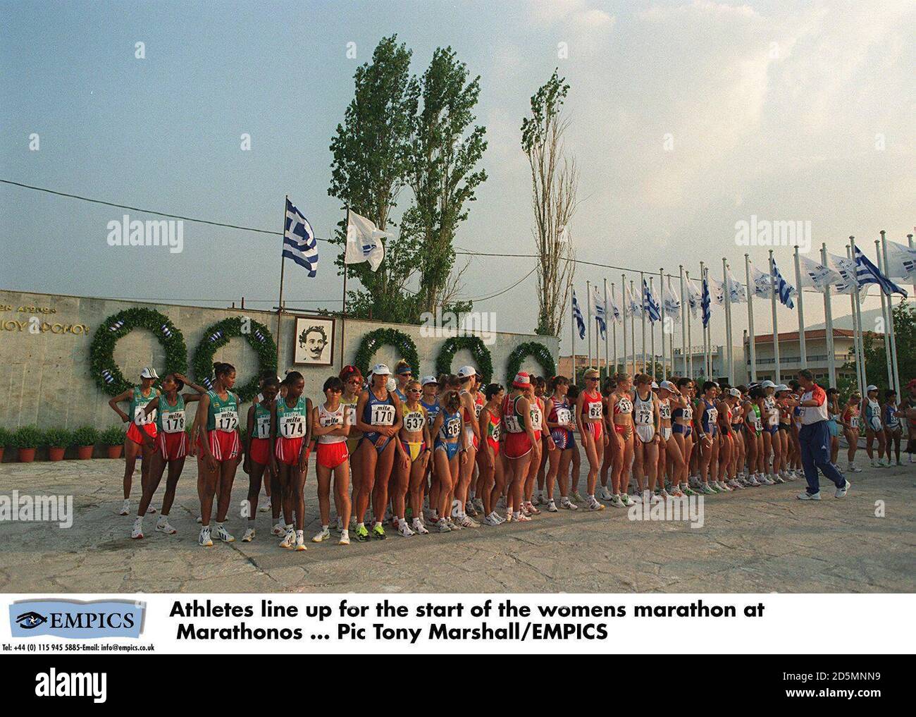 Athletes line up for the start of the womens marathon at Marathonos ...